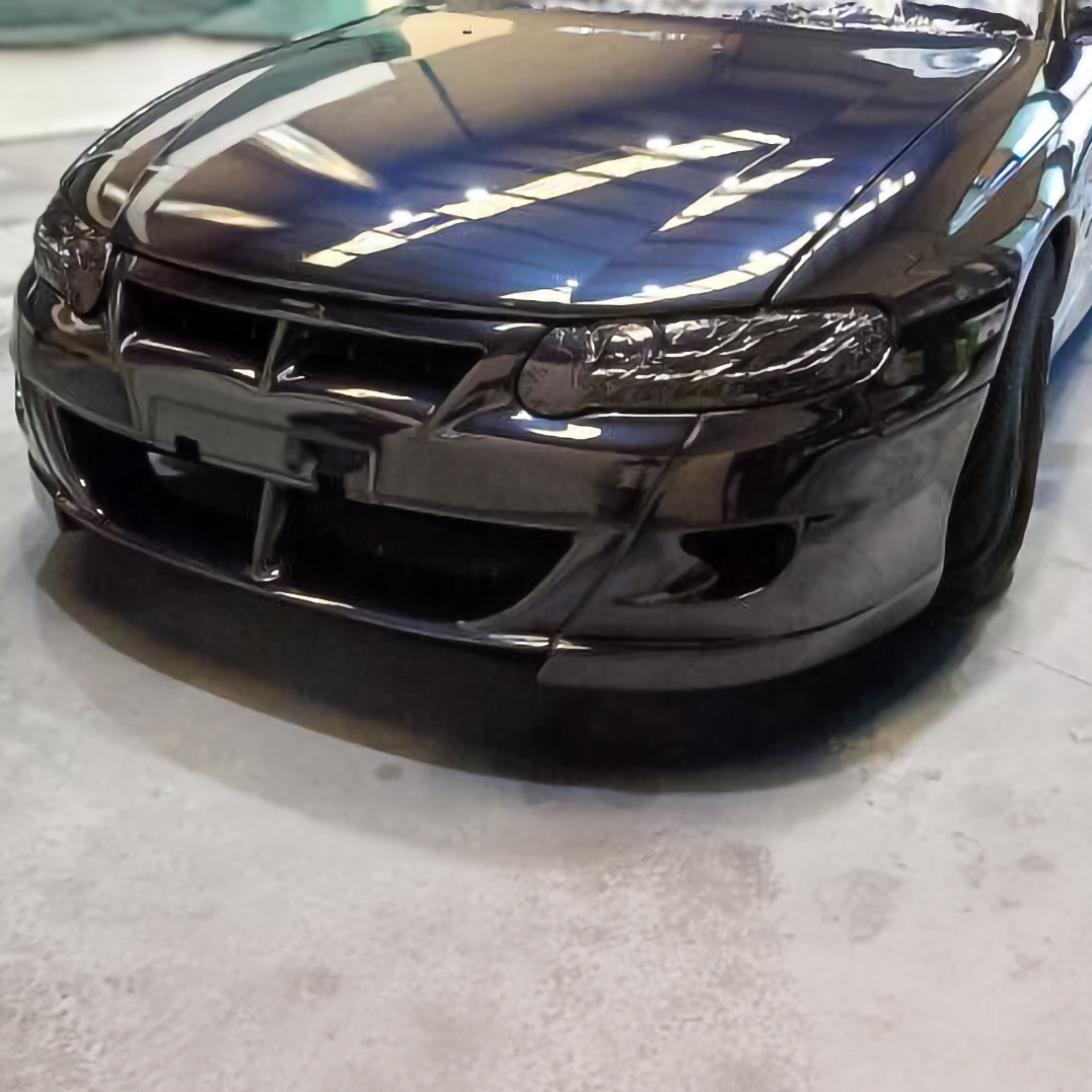 FULL CONVERSION BODY KIT FOR VX/VT SEDAN COMMODORE ( TEAR DROP HEADLIGHTS)
